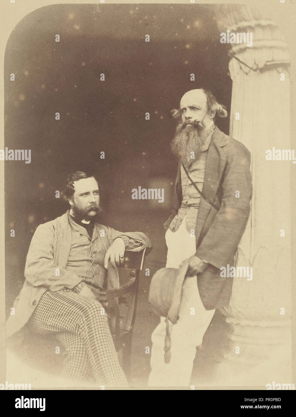 Portrait of two European men, one seated, one standing; Felice Beato ...