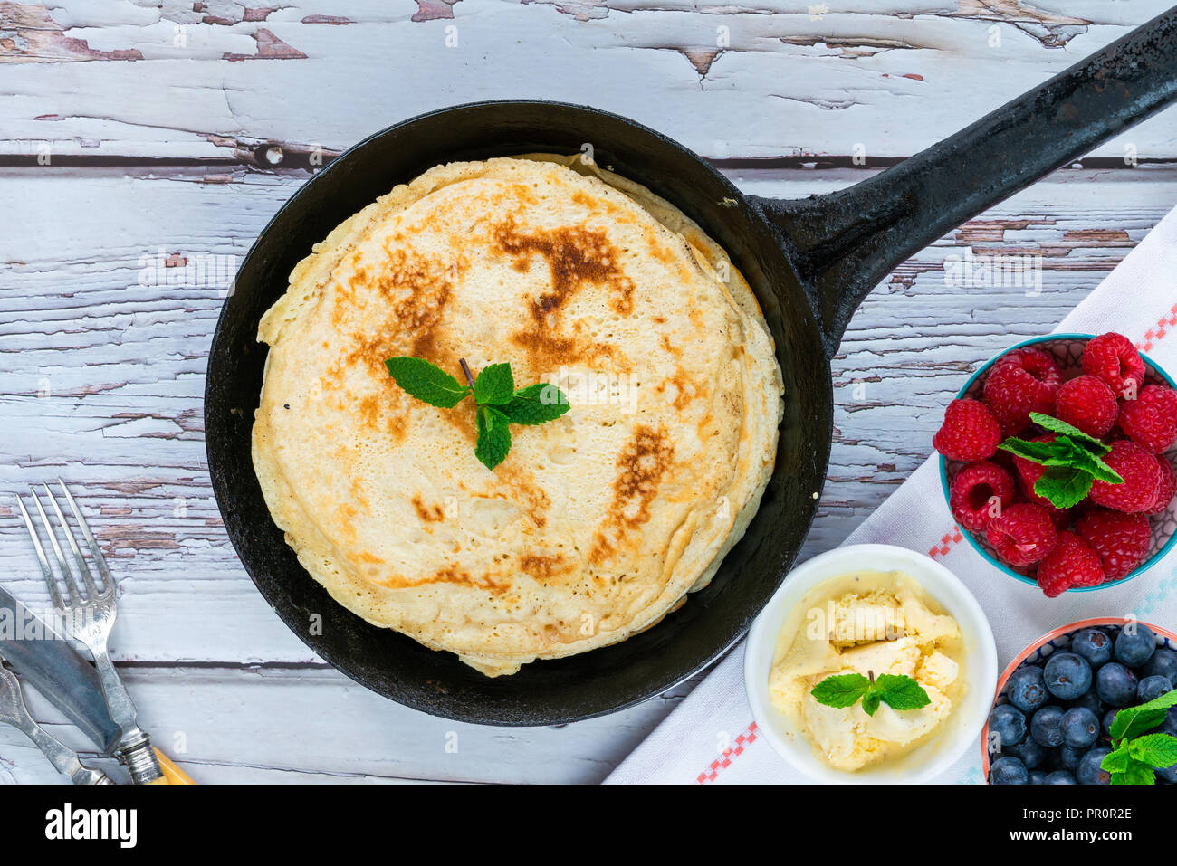 Pancakes on frying pan hi-res stock photography and images - Alamy