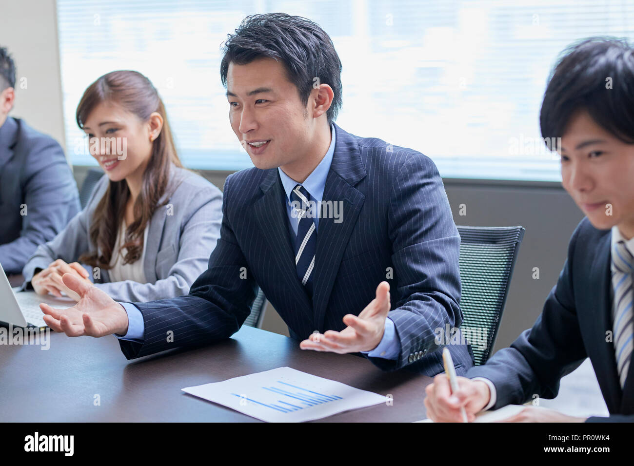 Japanese businesspeople in a meeting Stock Photo - Alamy