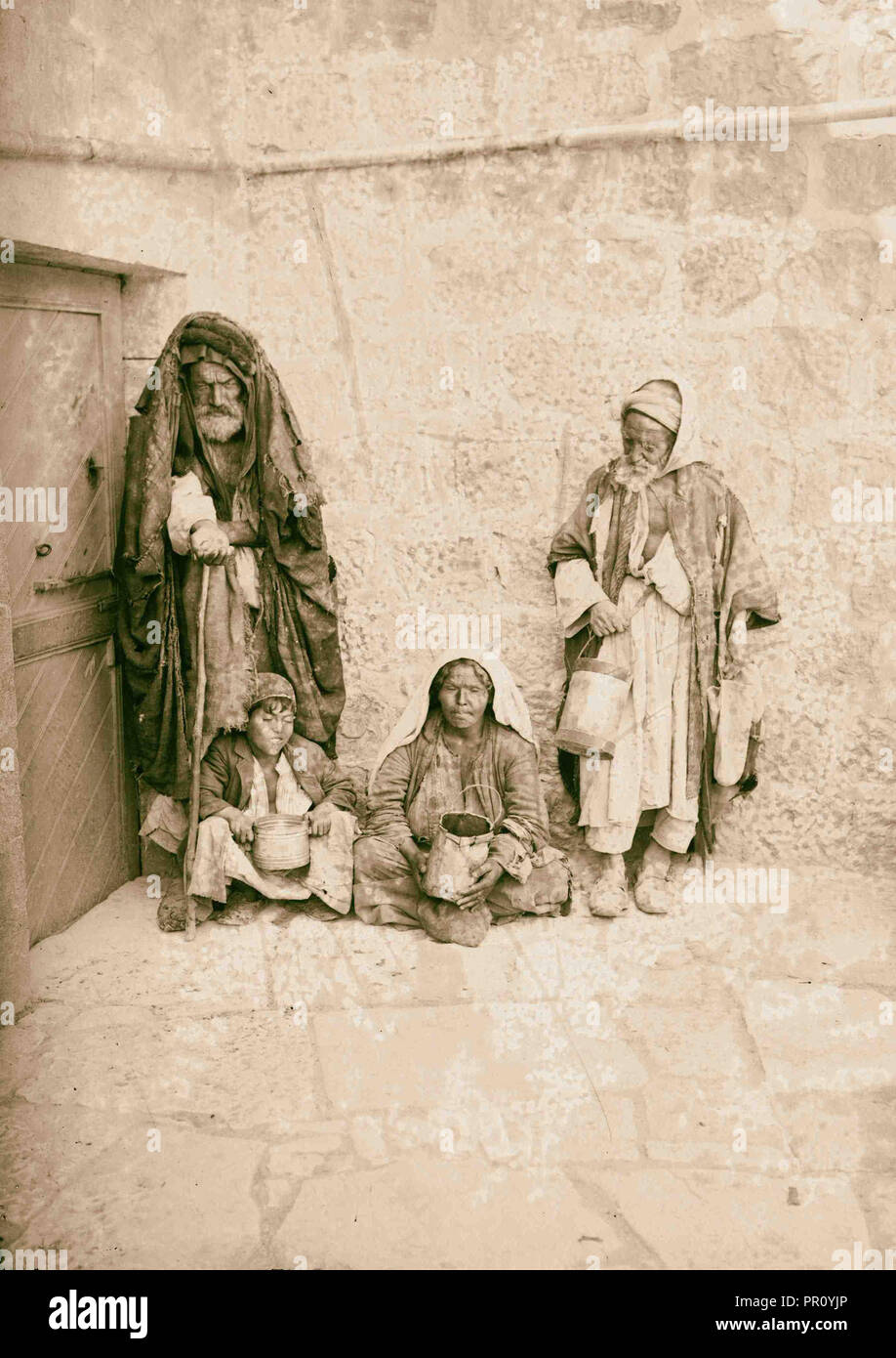 Beggars group hi-res stock photography and images - Alamy