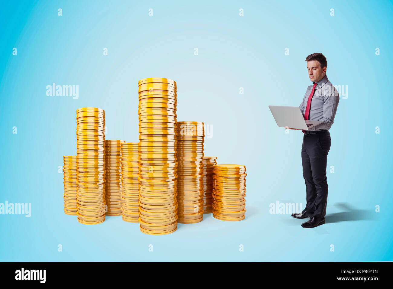 creative business man and gold coins concept Stock Photo - Alamy