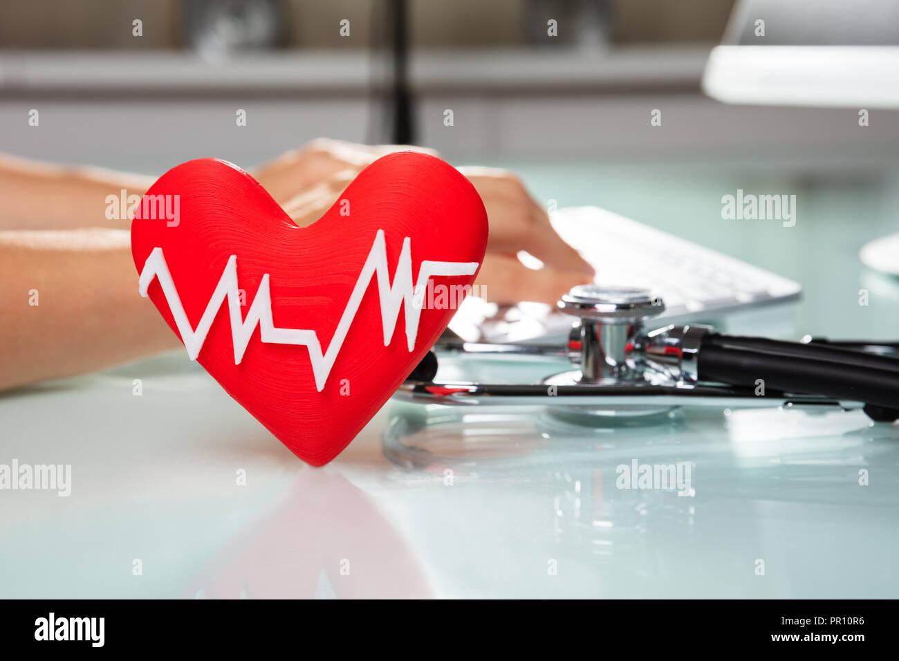 Ecg in front of heart symbol hi-res stock photography and images - Alamy