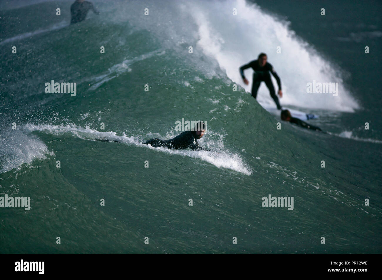 Wetsuited female surfers hi-res stock photography and images - Alamy