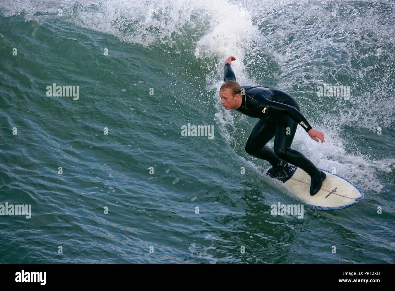 Wetsuited female surfers hi-res stock photography and images - Alamy