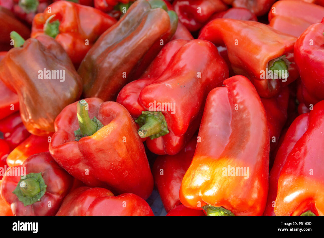 Food background with fresh red organic sweet paprika vegetables close ...
