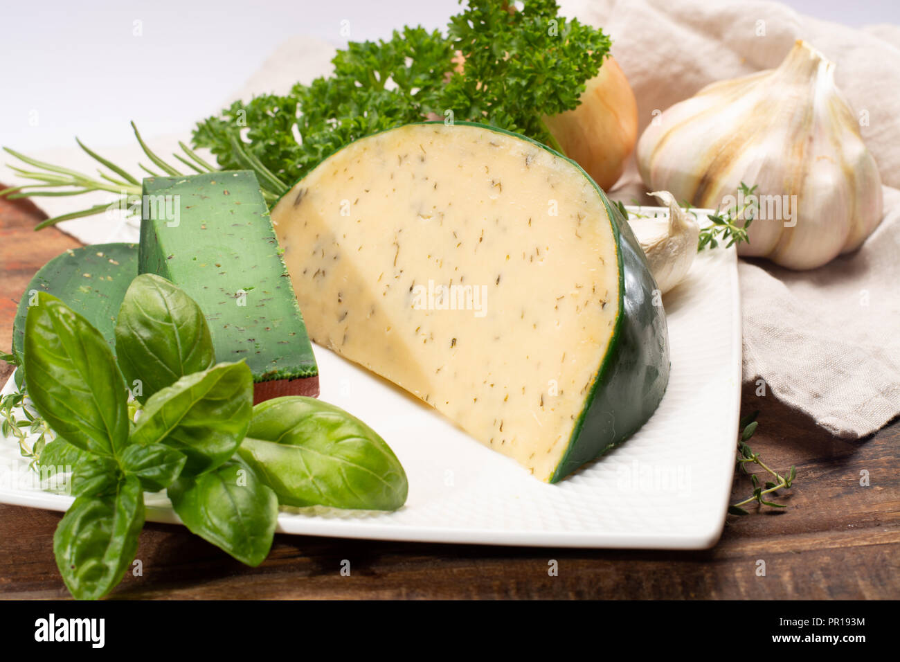 Dutch specialty hard cheese made from cows milk with different spices ...
