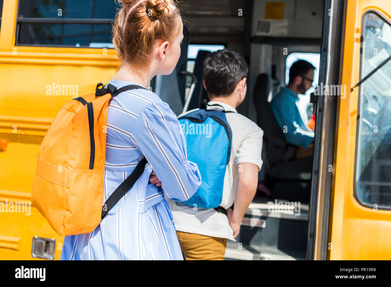 Children entering school bus hi-res stock photography and images - Alamy