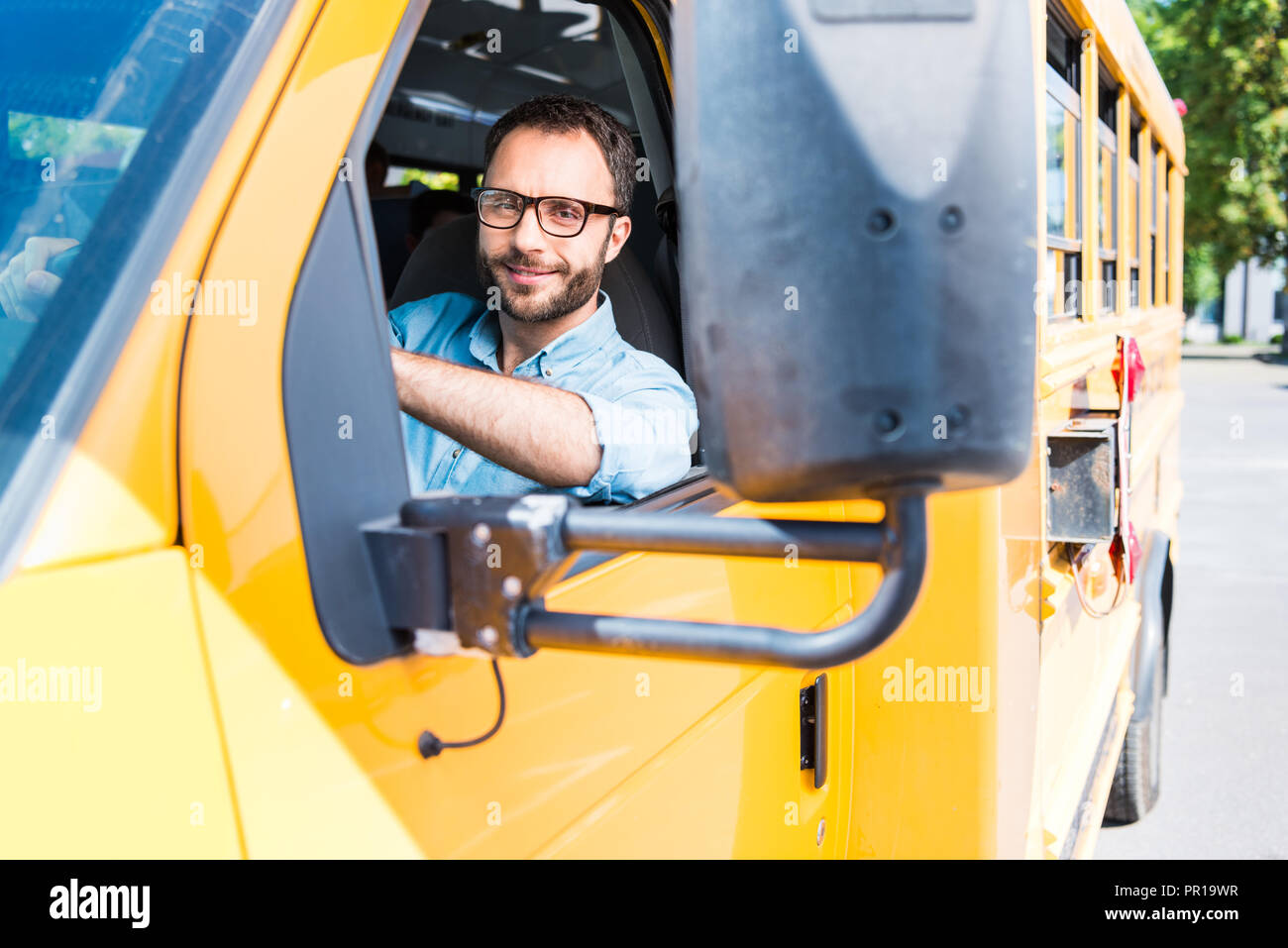 Handsome smiling school bus hi-res stock photography and images - Alamy