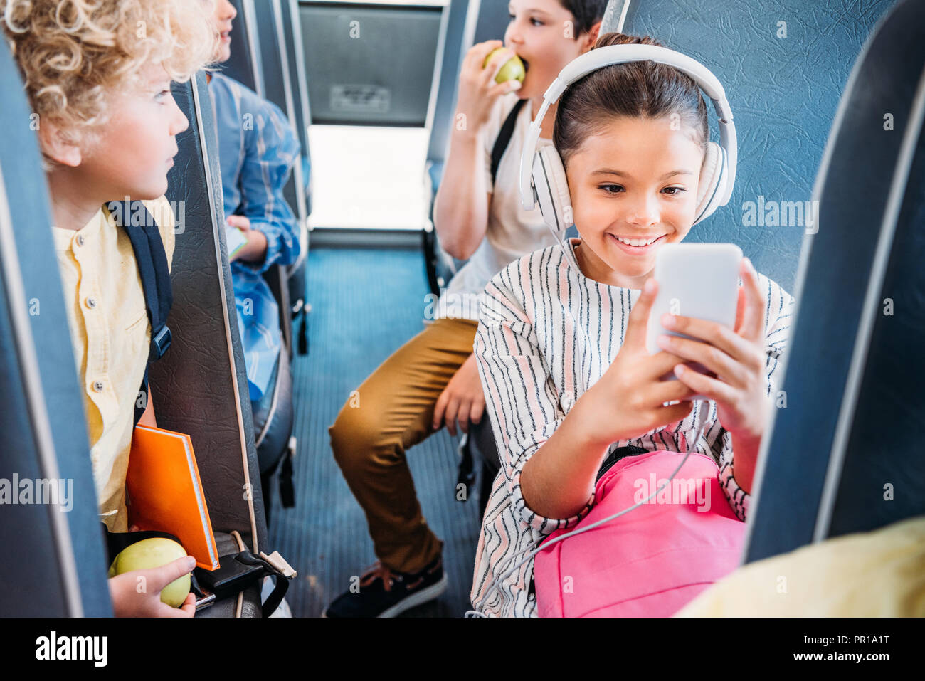 Kids bus smartphone hi-res stock photography and images - Alamy