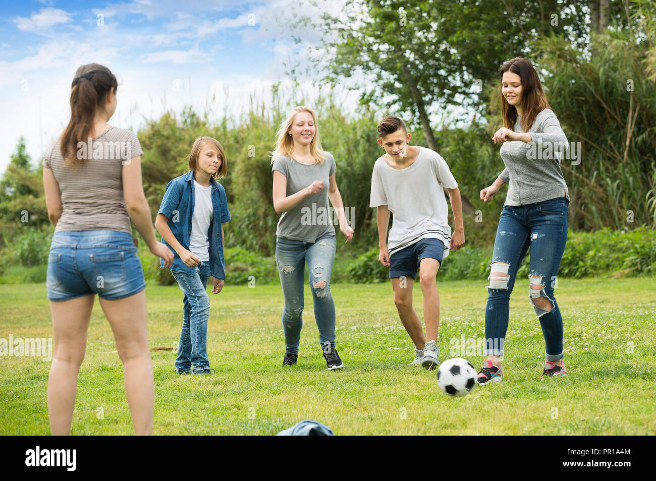 Friends Playing Football
