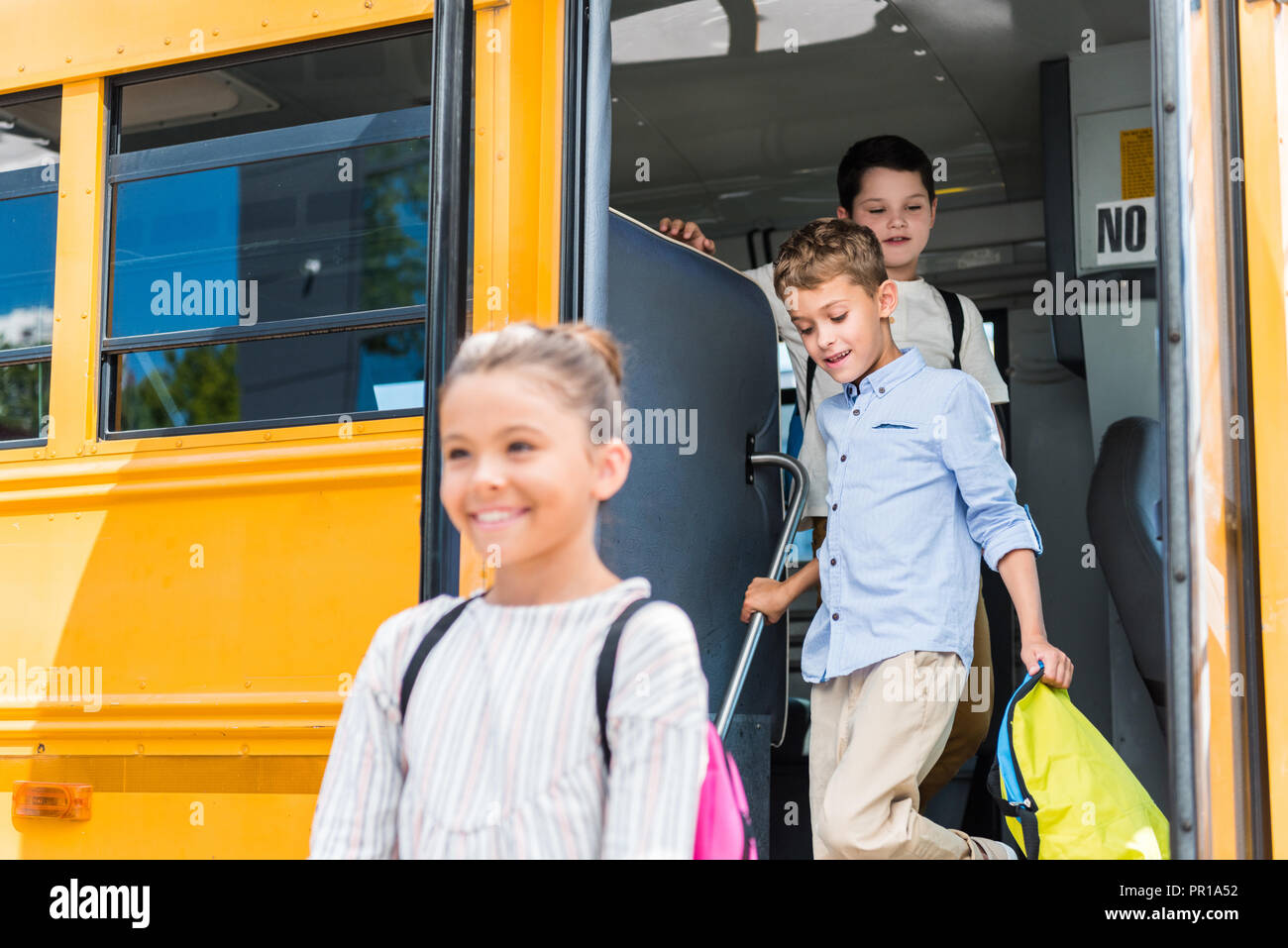Children going school bus hi-res stock photography and images - Alamy