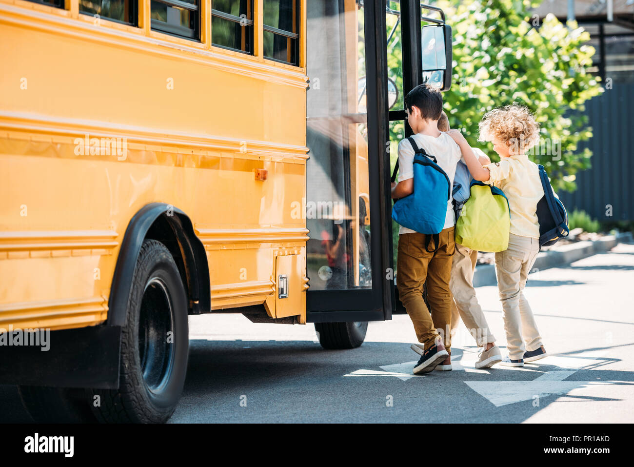 Kids entering school hi-res stock photography and images - Alamy