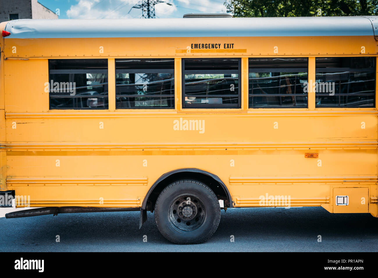 side view of parked empty school bus Stock Photo - Alamy