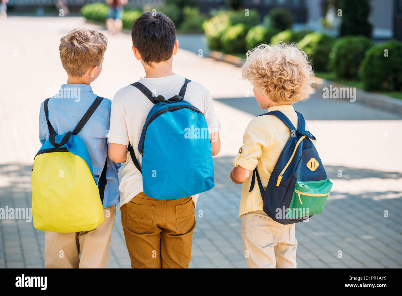 Kids garden rear view hi-res stock photography and images - Alamy