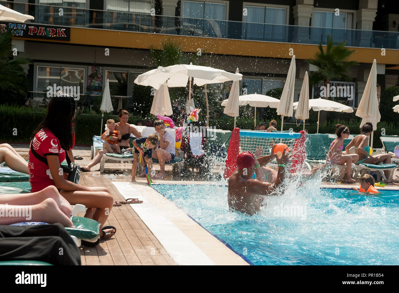 People playing in the pool in a water polo ball Stock Photo - Alamy