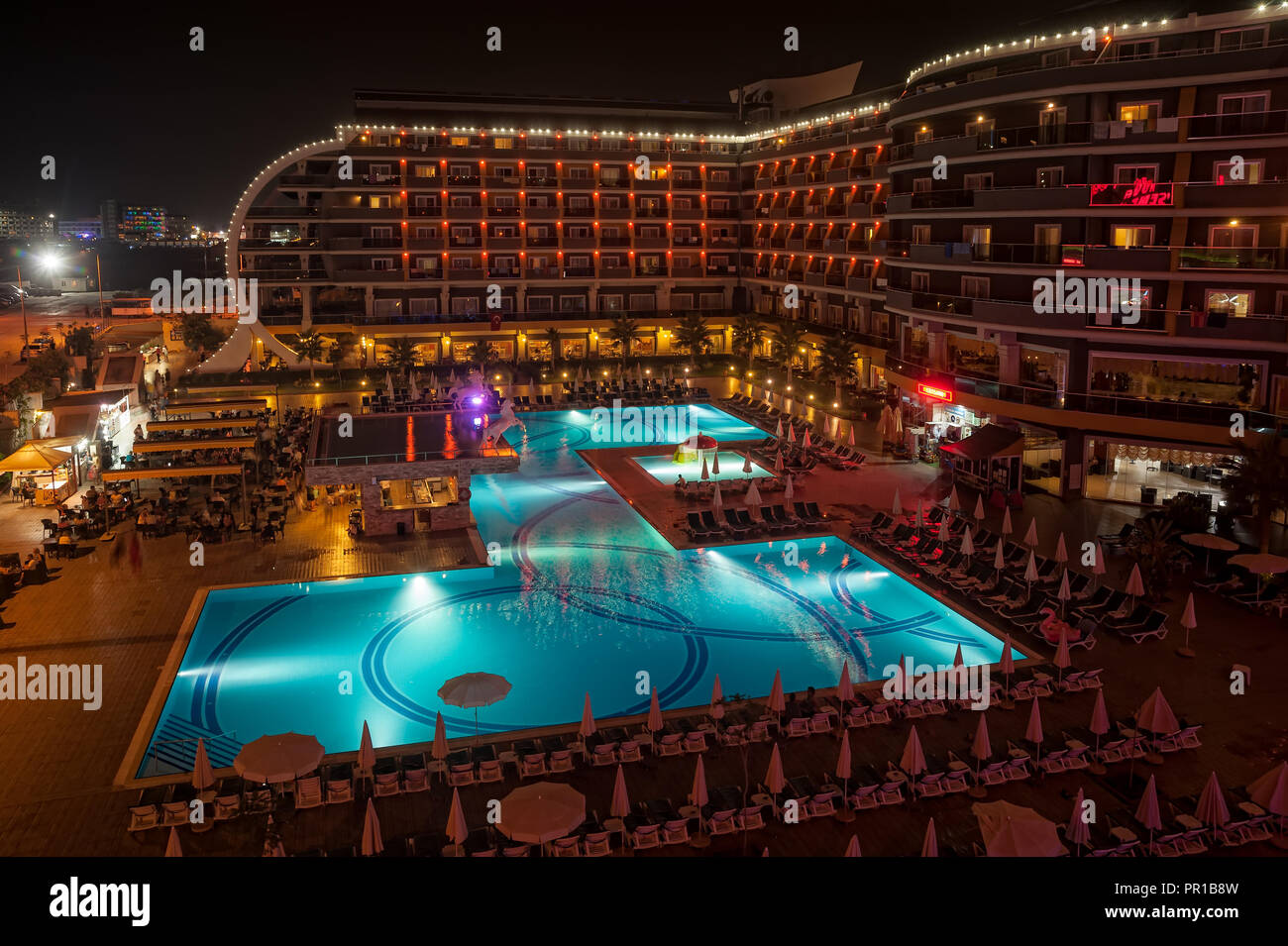 Luxury hotel with pool at night. Turkey Stock Photo - Alamy