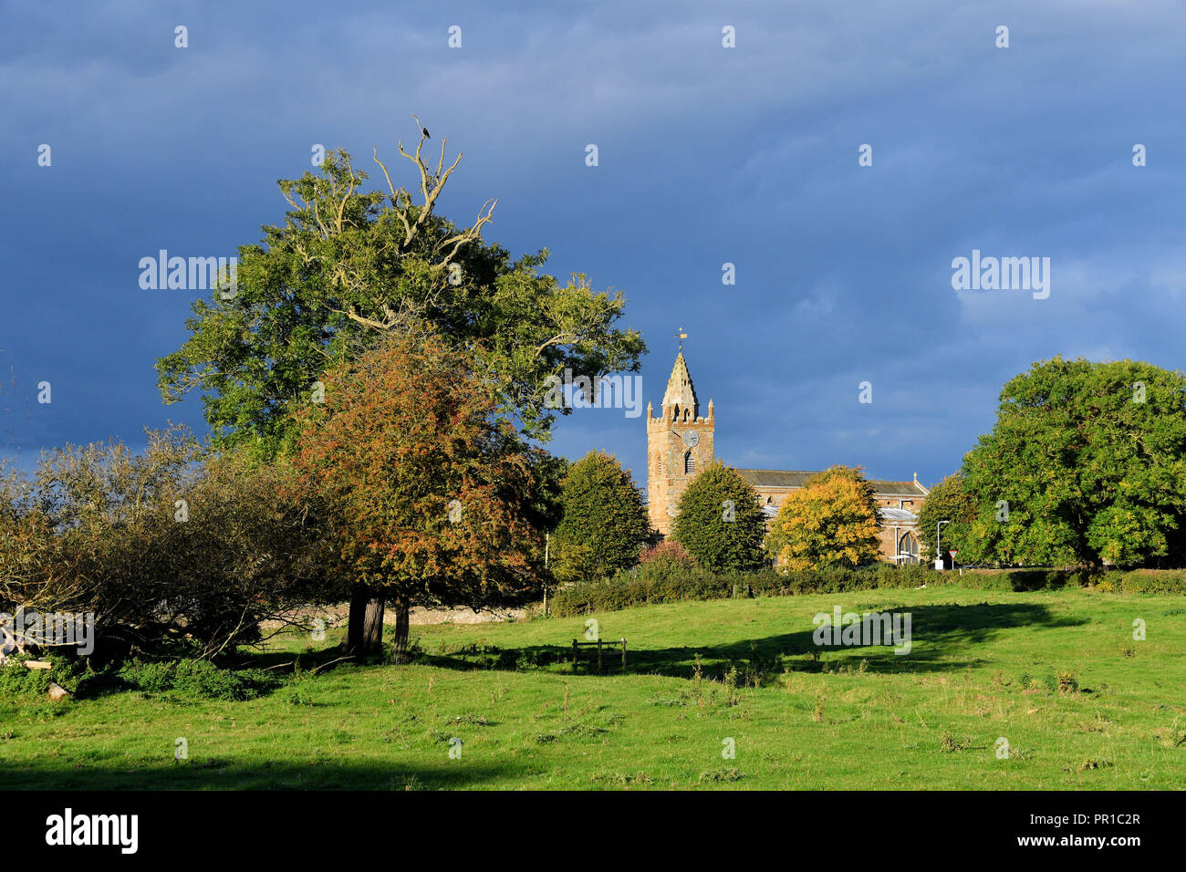 Storm over the church Stock Photo - Alamy