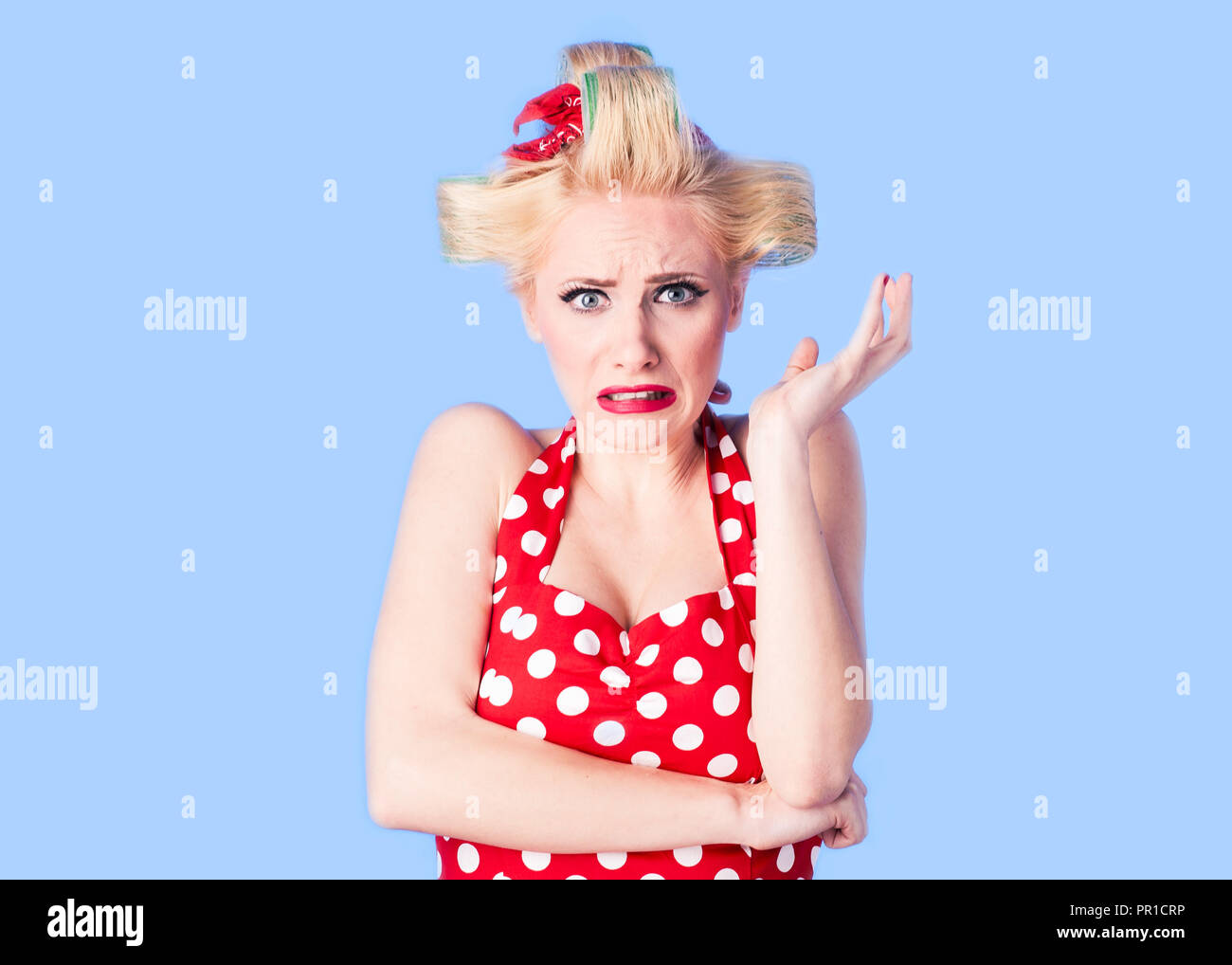 A surprised blonde pin up girl Stock Photo - Alamy