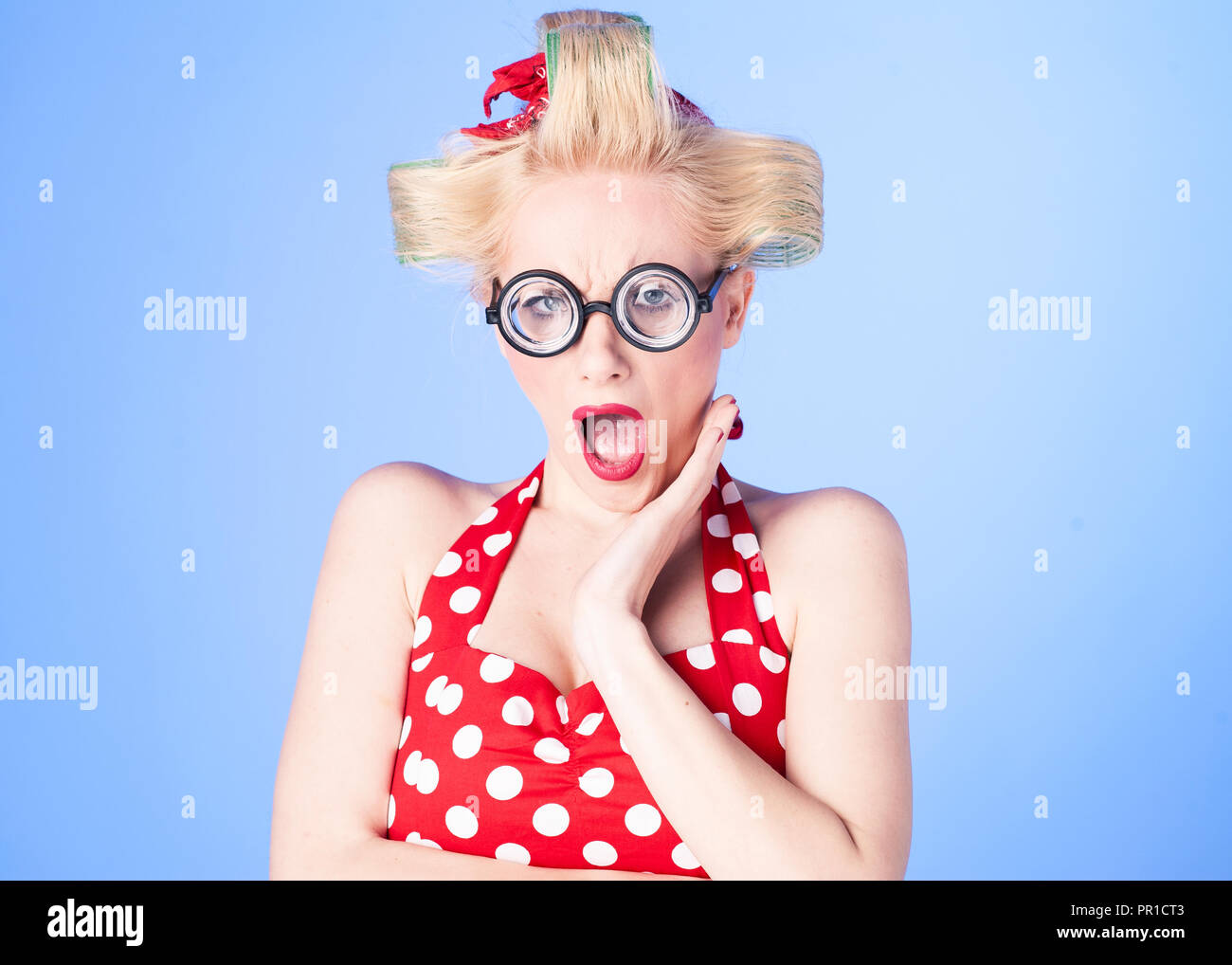 A surprised blonde pin up girl Stock Photo - Alamy