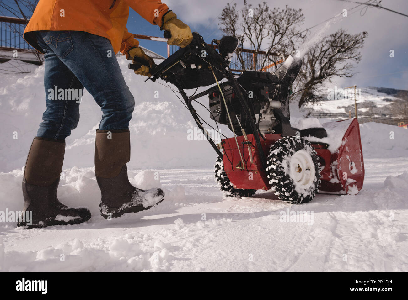 Worker using blower hi-res stock photography and images - Alamy