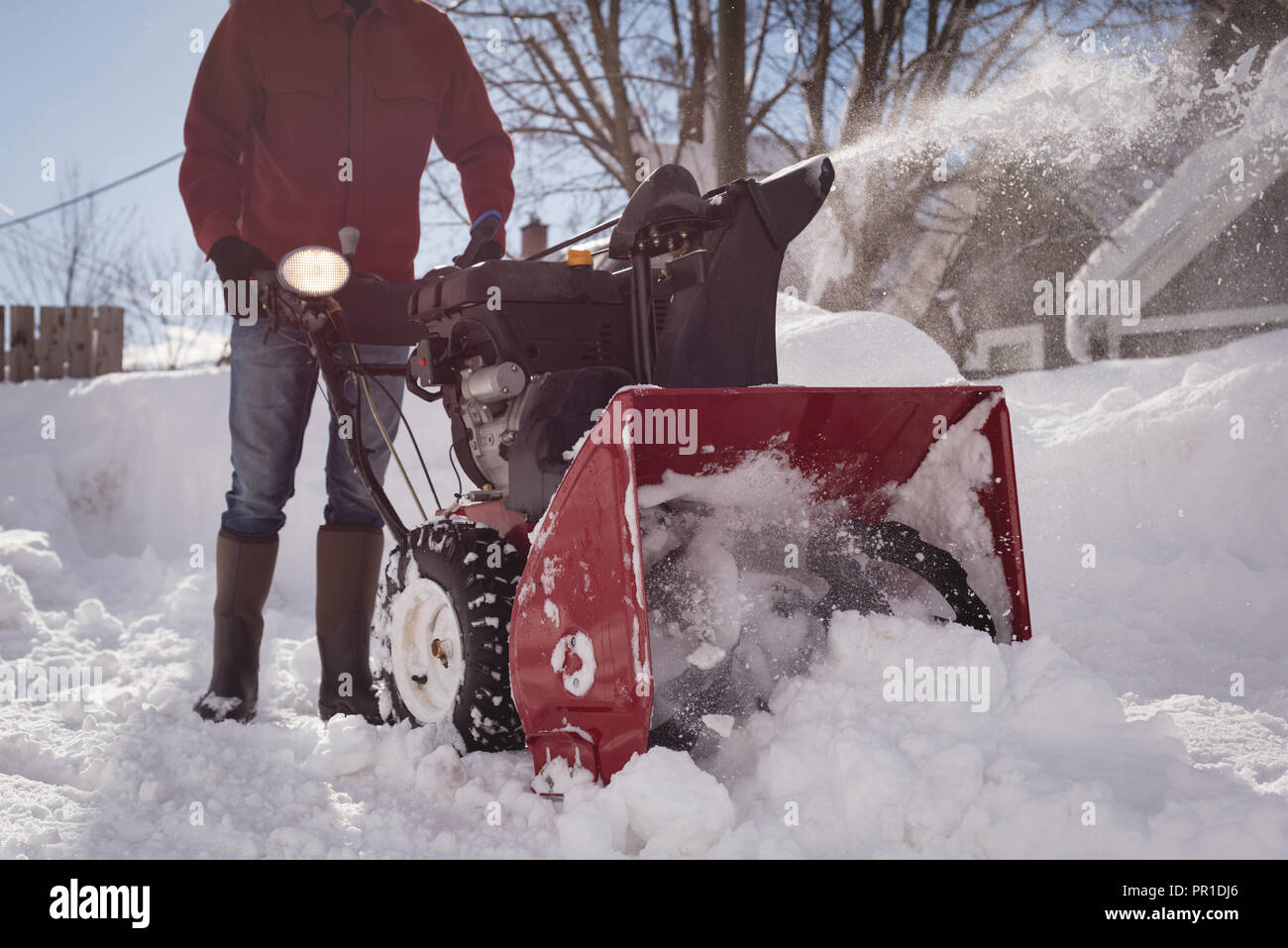 Using snow blower hi-res stock photography and images - Alamy
