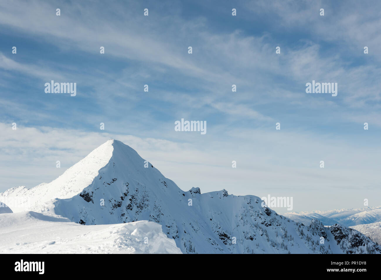 Snow capped mountains during winter Stock Photo - Alamy