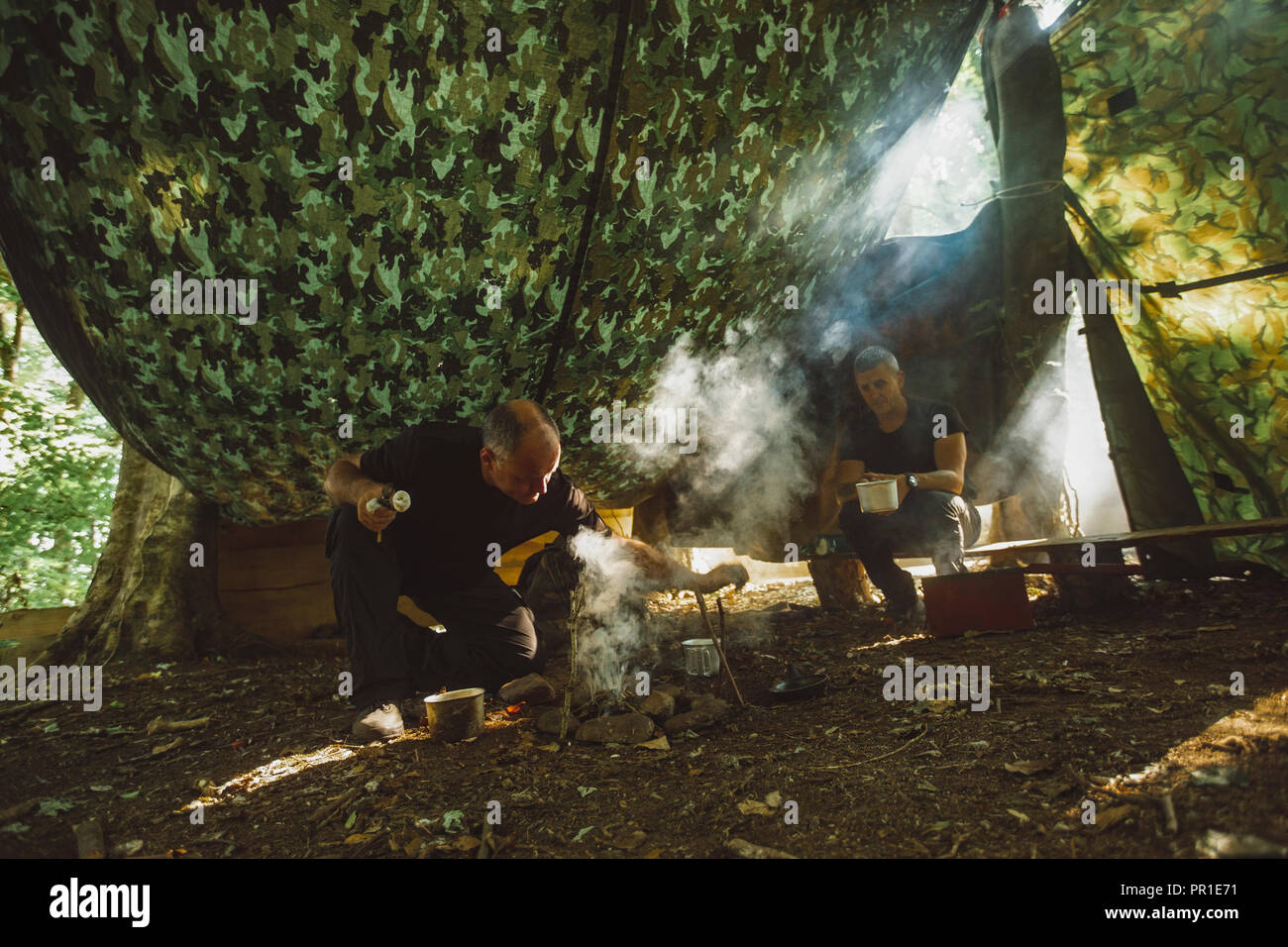 Preparing military food hi-res stock photography and images - Alamy