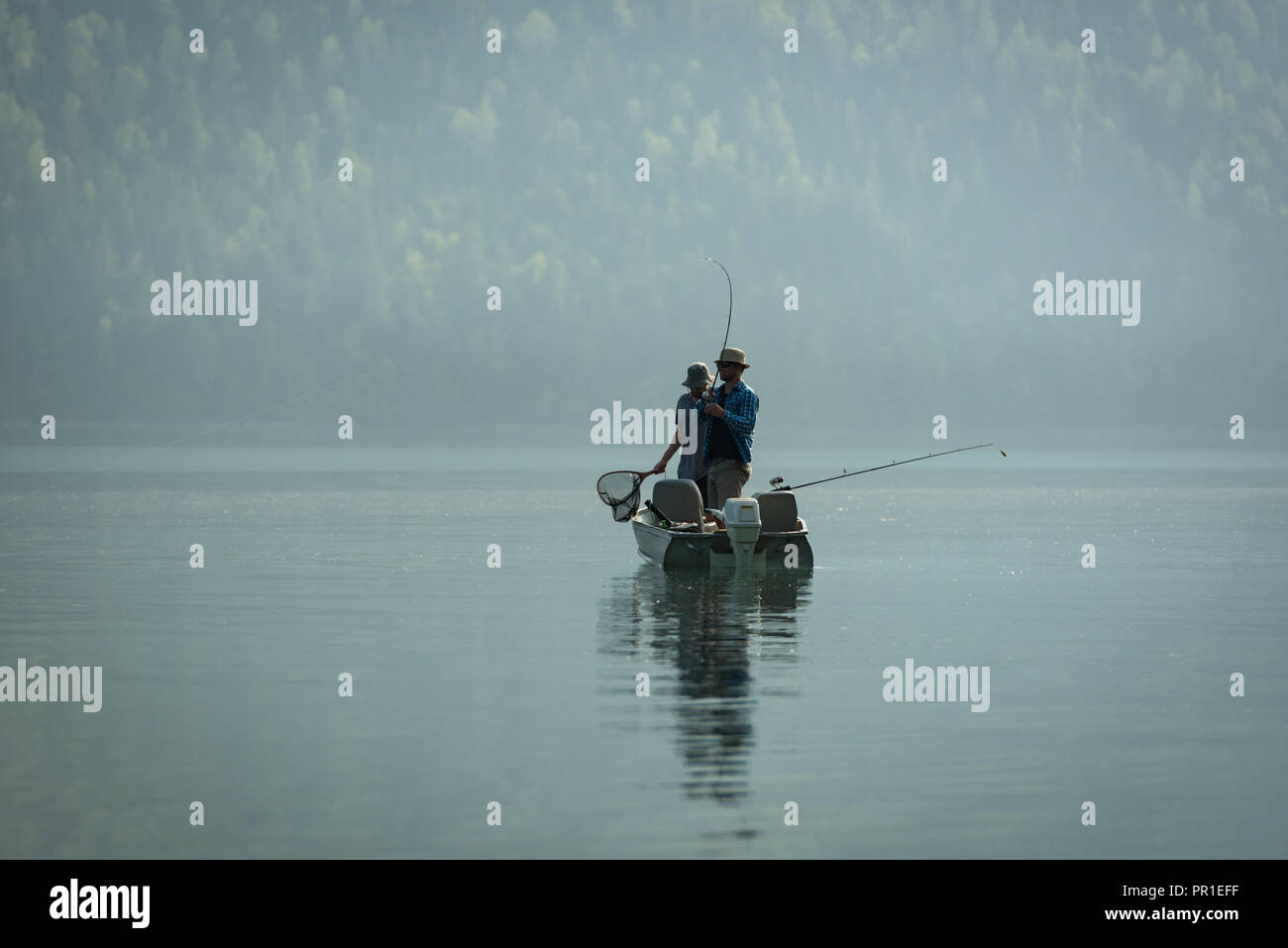 Young japanese man fishing hi-res stock photography and images - Alamy