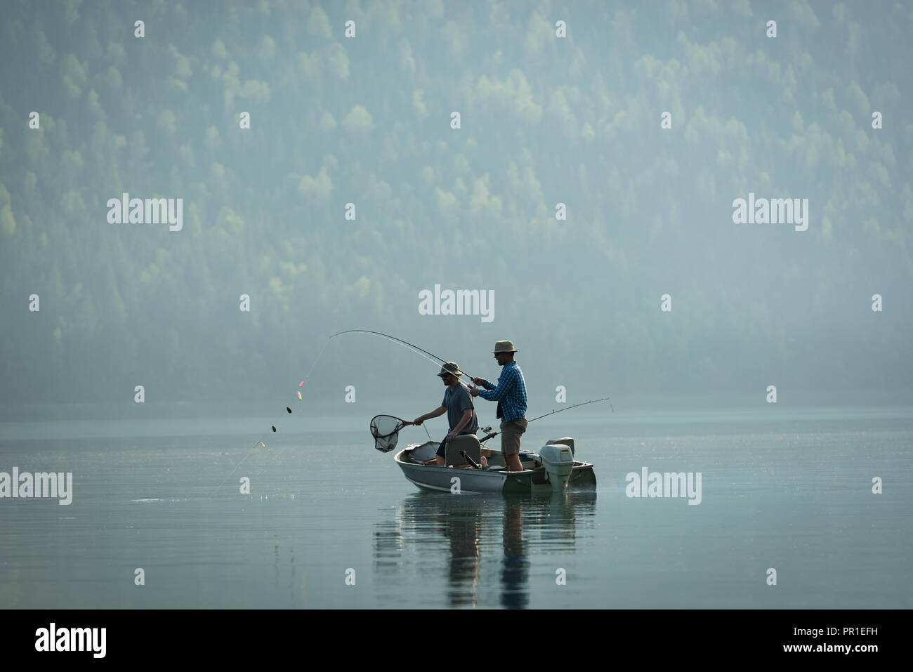 Two fishermen hi-res stock photography and images - Alamy