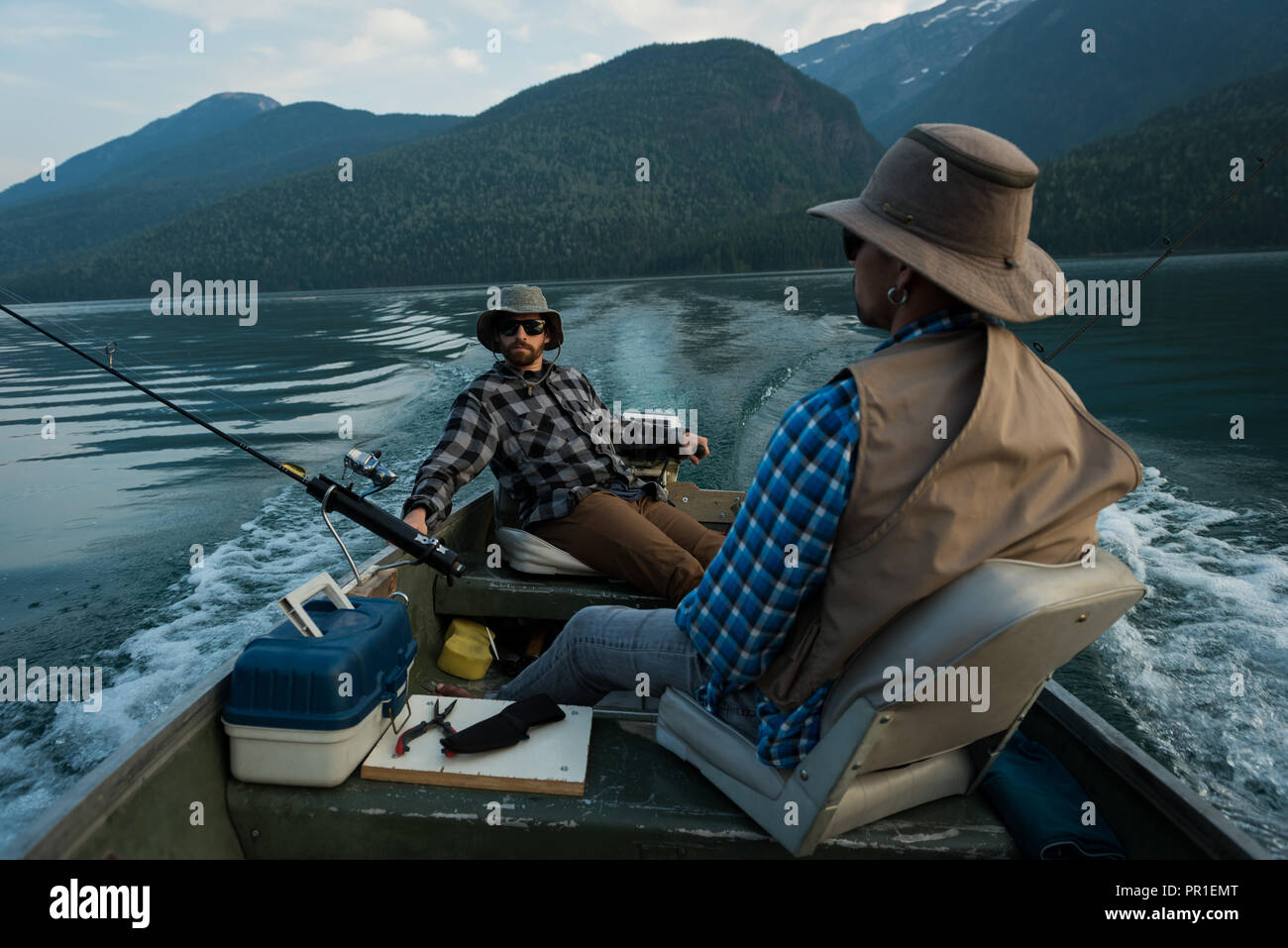 Two fishermen fishing in the river Stock Photo - Alamy