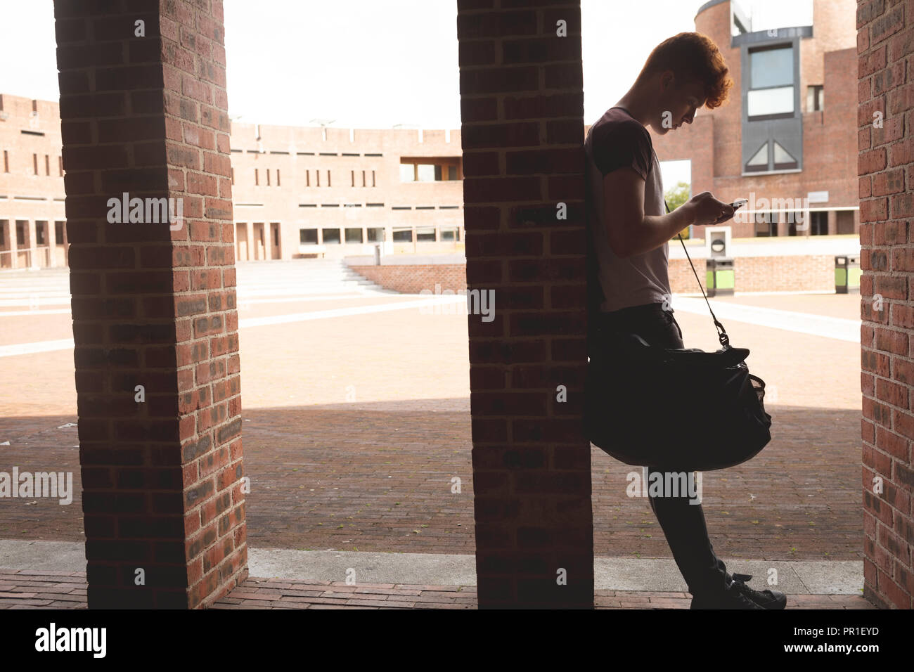College student using mobile phone Stock Photo - Alamy
