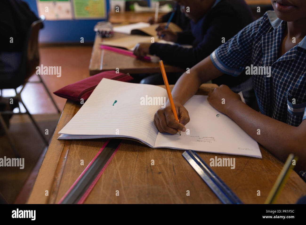 Students studying in the classroom Stock Photo - Alamy