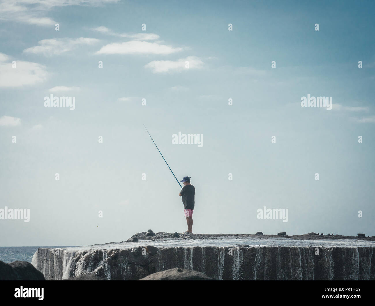 Fisherman in the ocean hi-res stock photography and images - Alamy