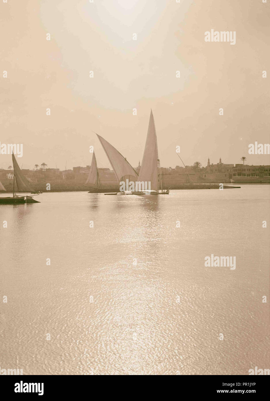 Egypt. Cairo and Memphis, etc. Nile scene with typical boats in full ...