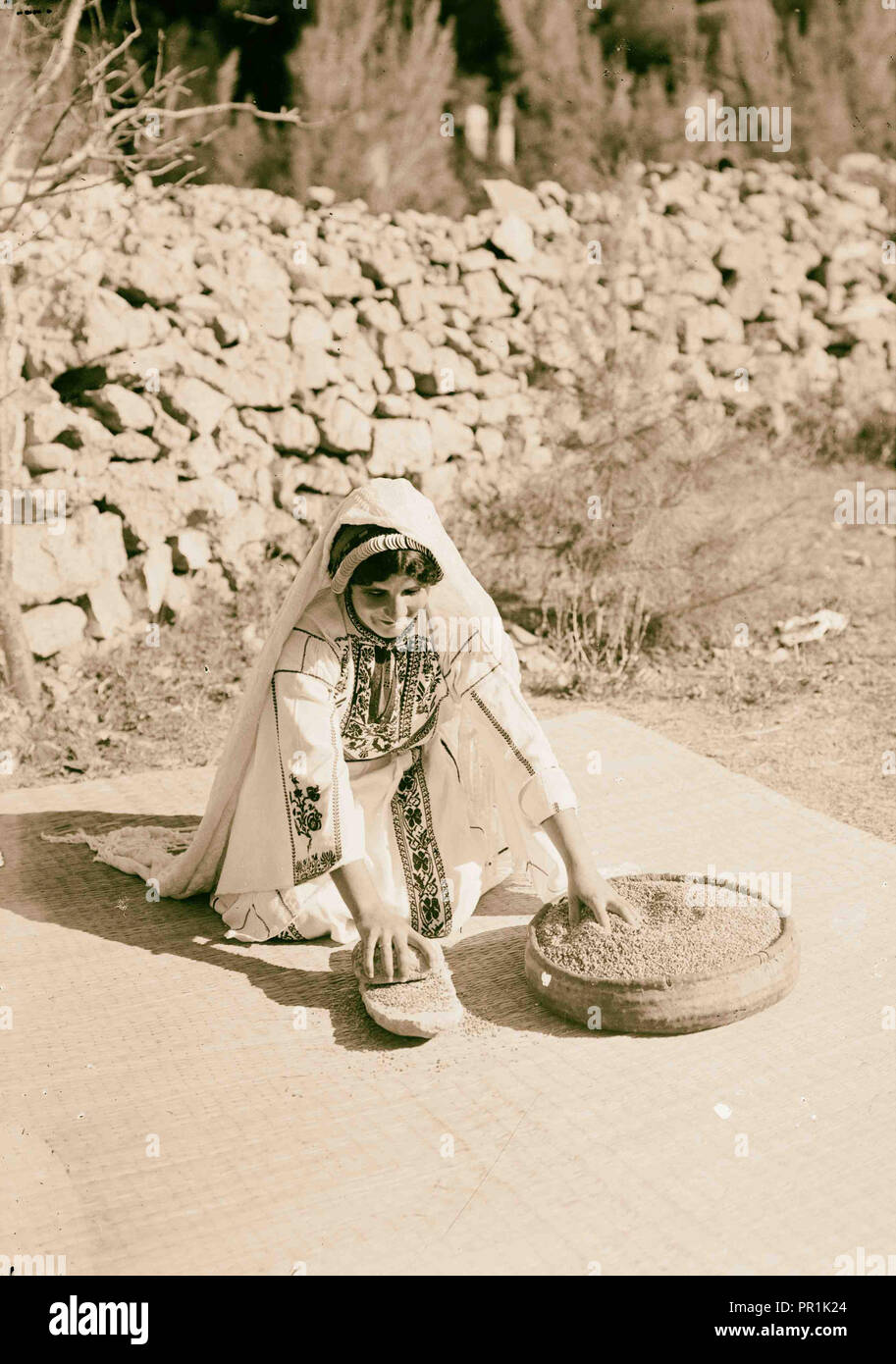 Agriculture, Primitive methods of rubbing and grinding wheat. 'Rubbing ...