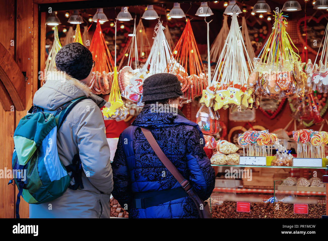 People at Sweet stall of cookies and candies on Christmas Market at ...