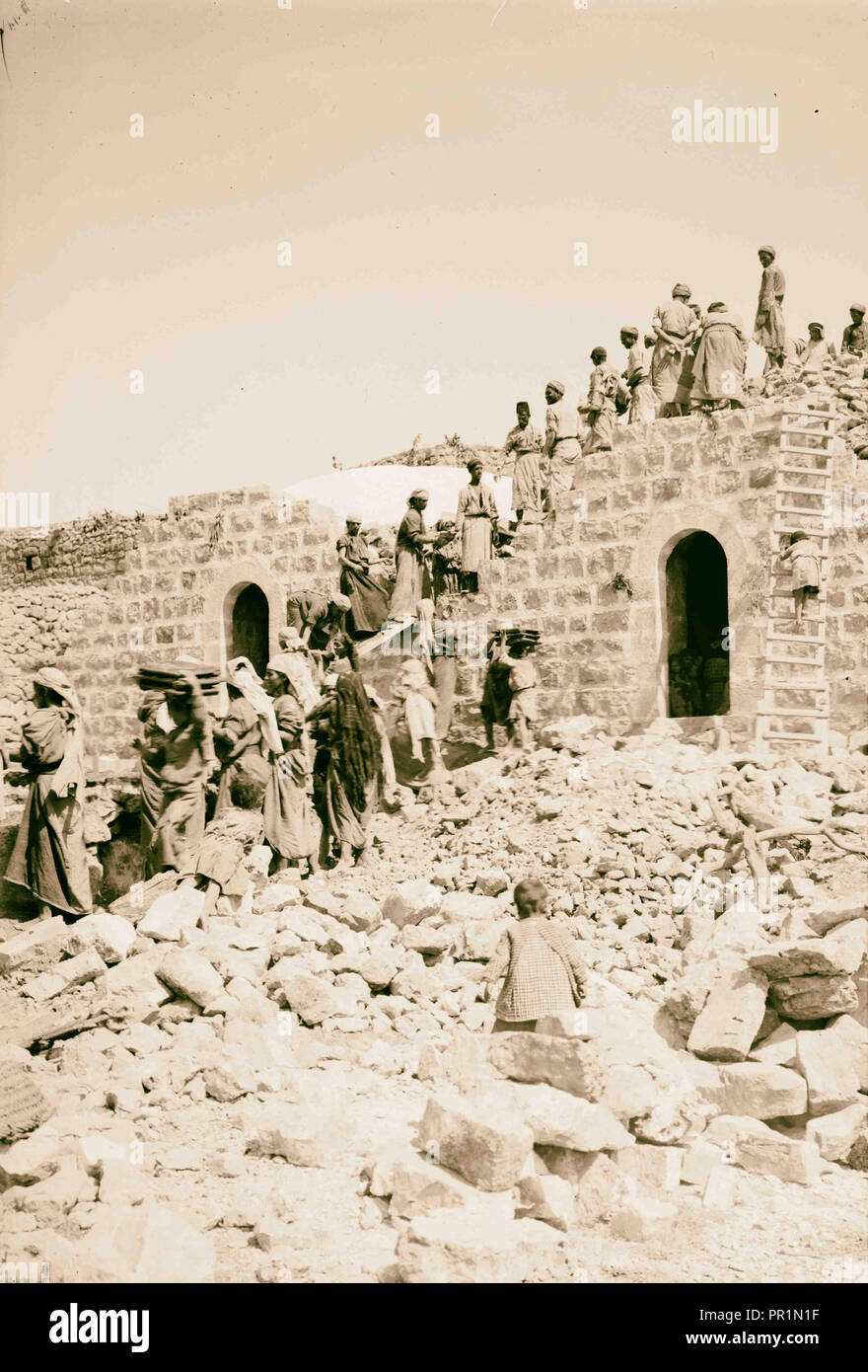 Building a stone home in Palestine. 1898 Stock Photo - Alamy