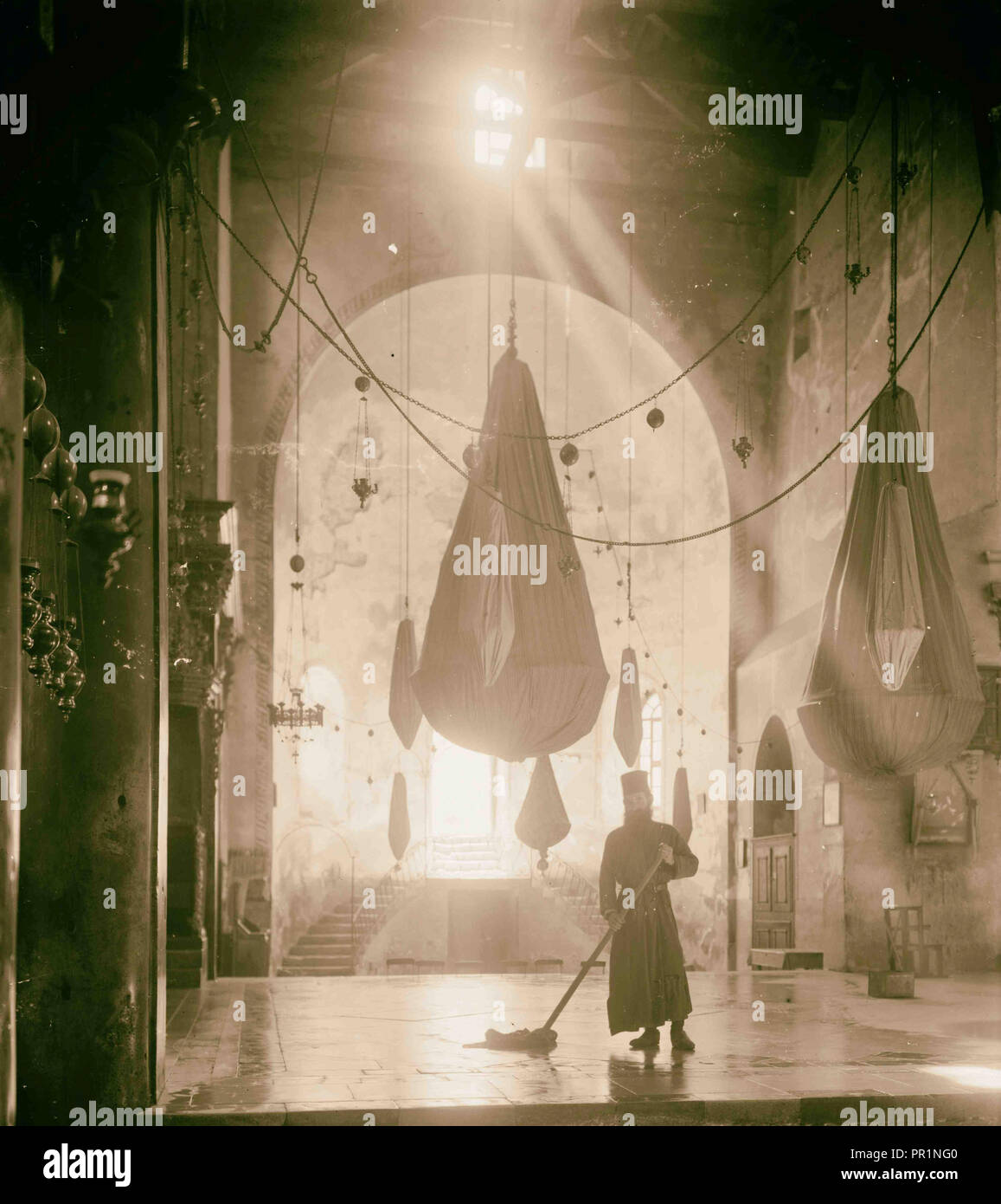 Monk sweeping floor hi-res stock photography and images - Alamy