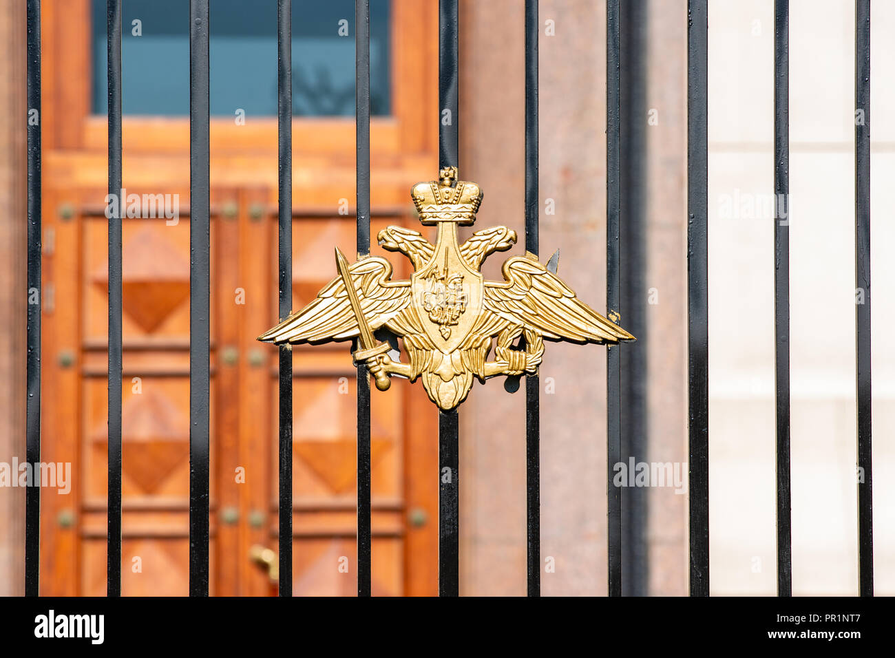 Imperial Russian double eagle with Saint George on the forged gate ...