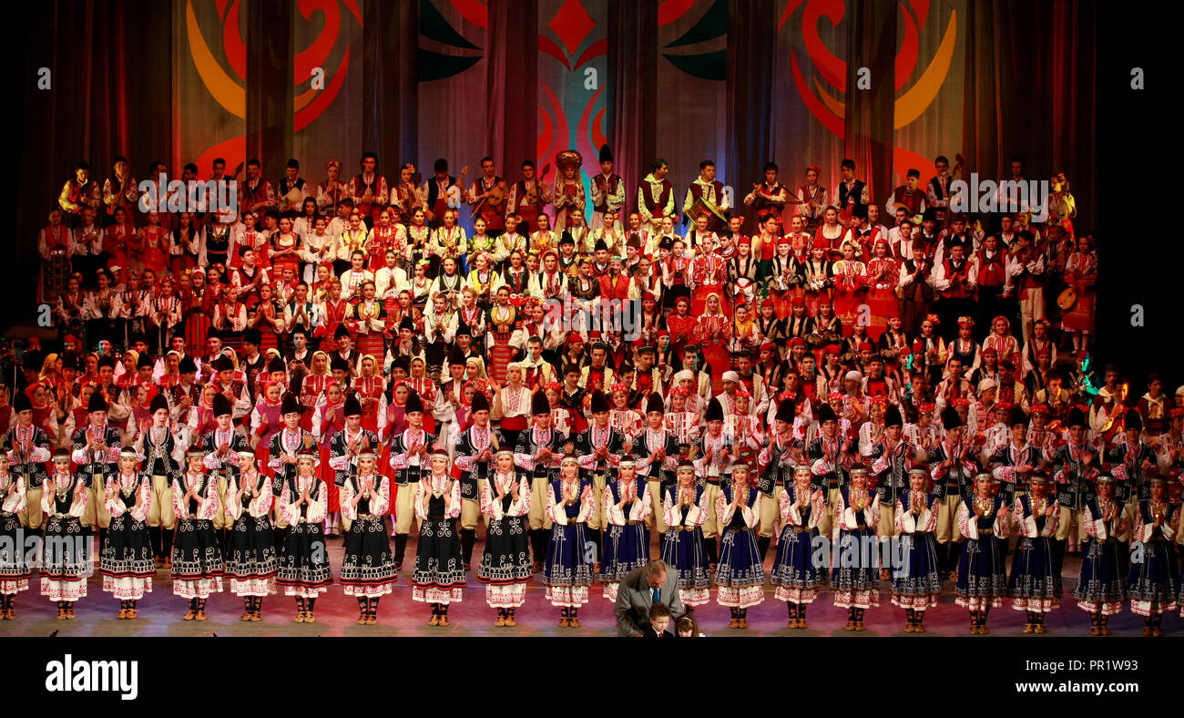 People in traditional folklore costumes perform folk dance bulgarian ...