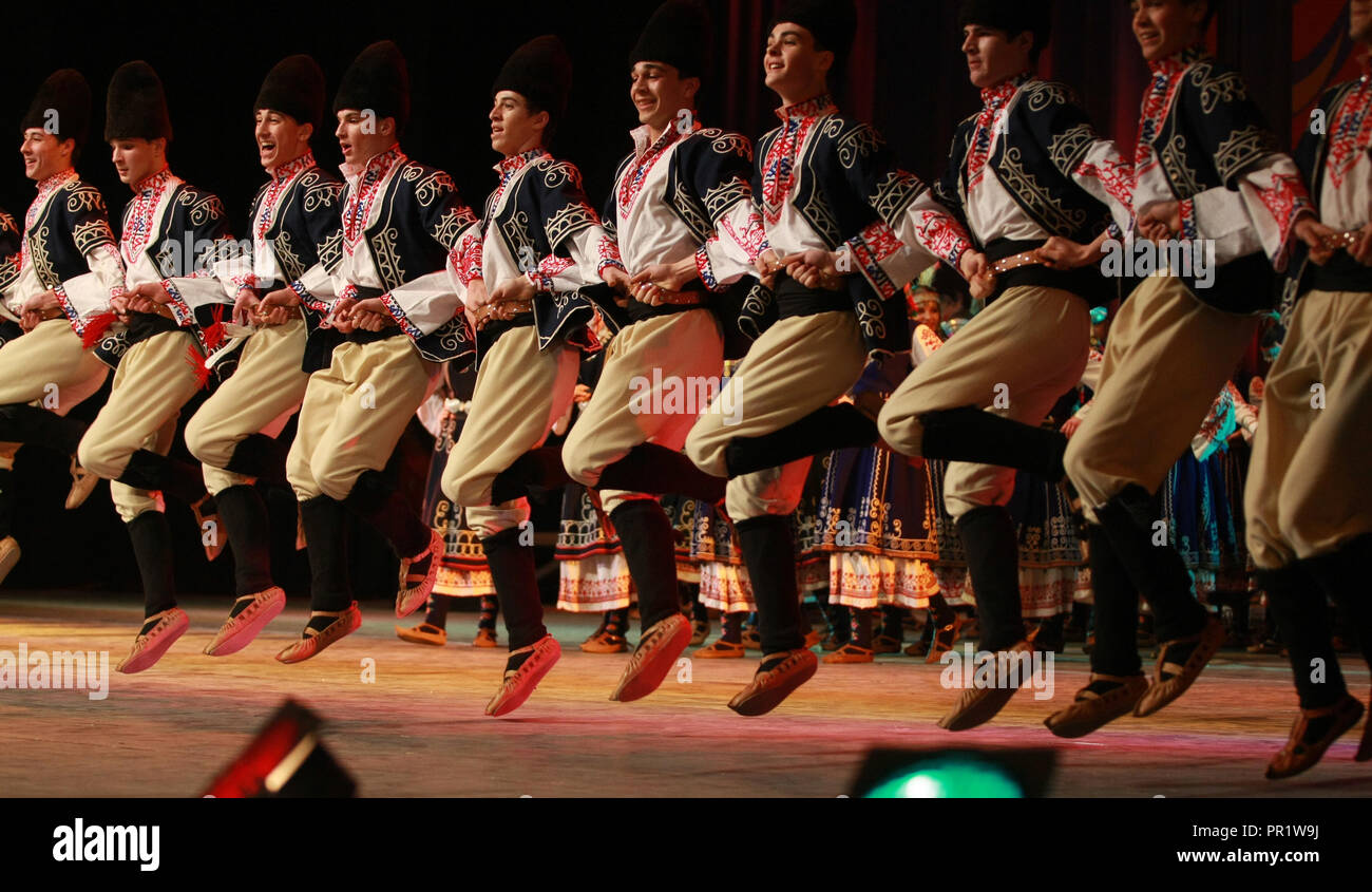 People in traditional folklore costumes perform folk dance bulgarian ...