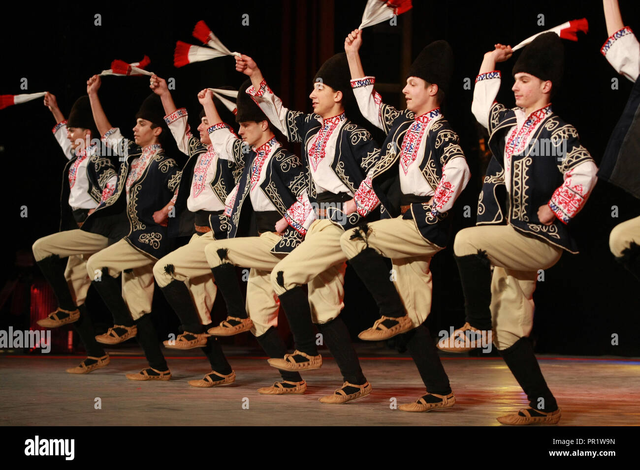 People in traditional folklore costumes perform folk dance bulgarian ...