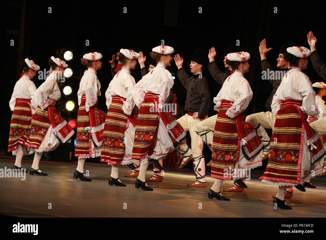 People in traditional folklore costumes perform folk dance bulgarian ...