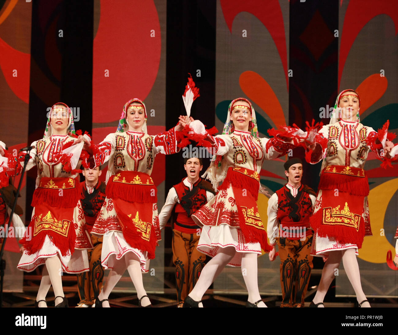 People in traditional folklore costumes perform folk dance bulgarian ...