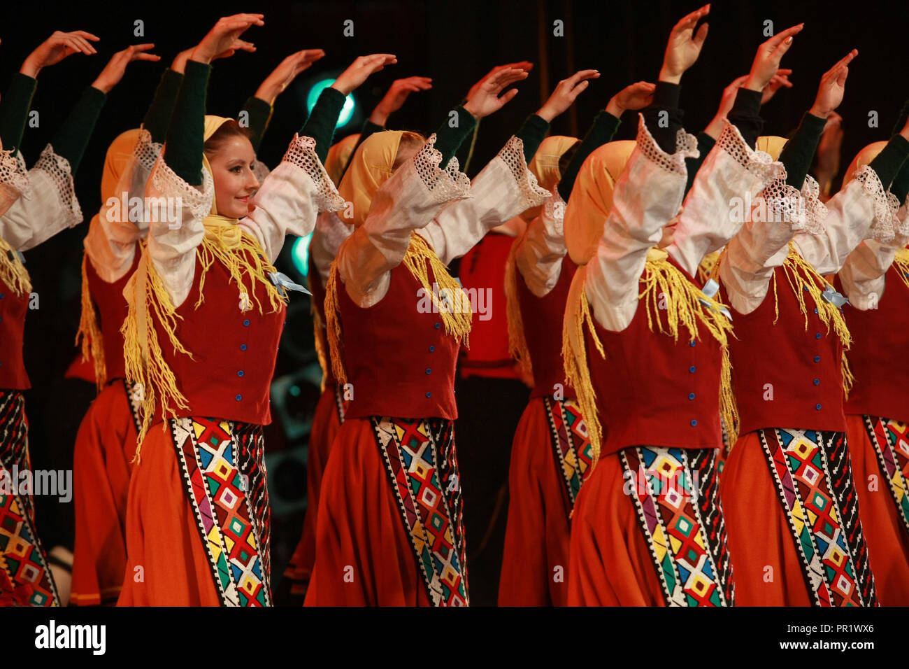People in traditional folklore costumes perform folk dance bulgarian ...