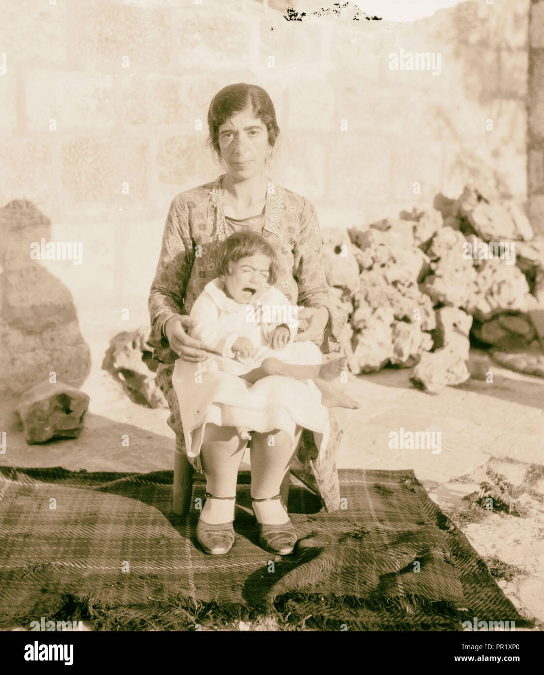 Anna Spafford baby home in Jerusalem. Photograph shows a woman with a ...