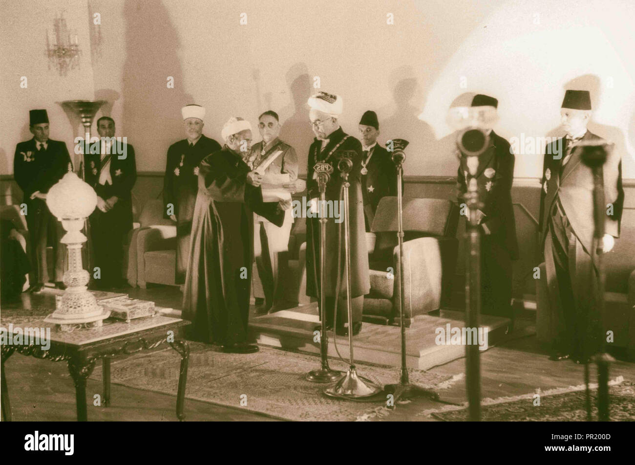 Coronation' of King Abdullah in Amman. Sheik handing King Abdullah ...