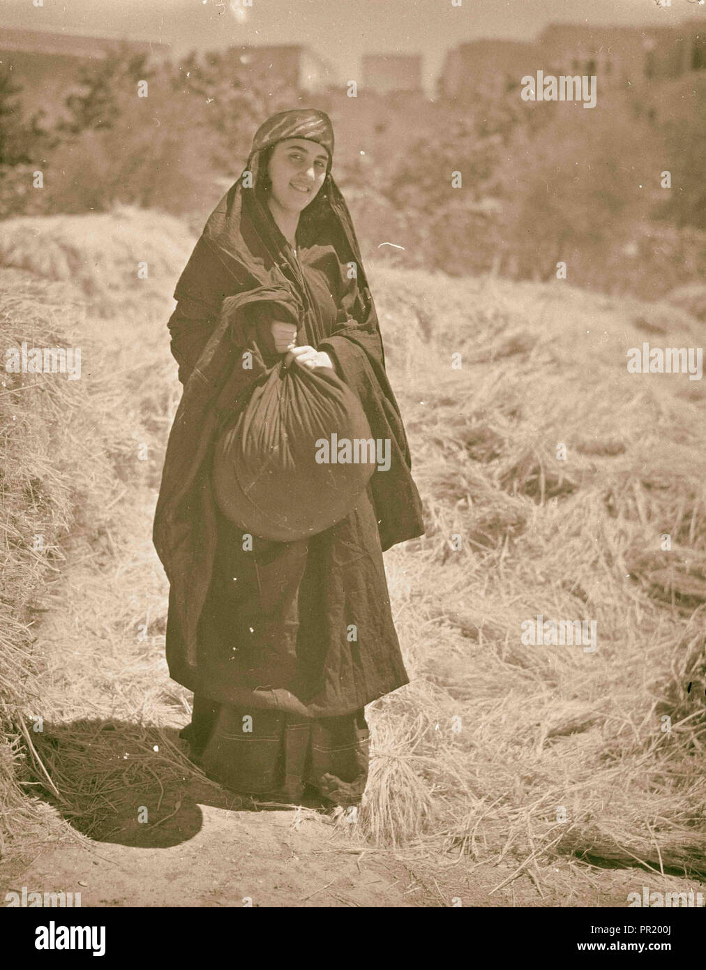 Ruth story. 'Ruth' carrying off wheat measured by 'Boaz' 1940, Middle ...