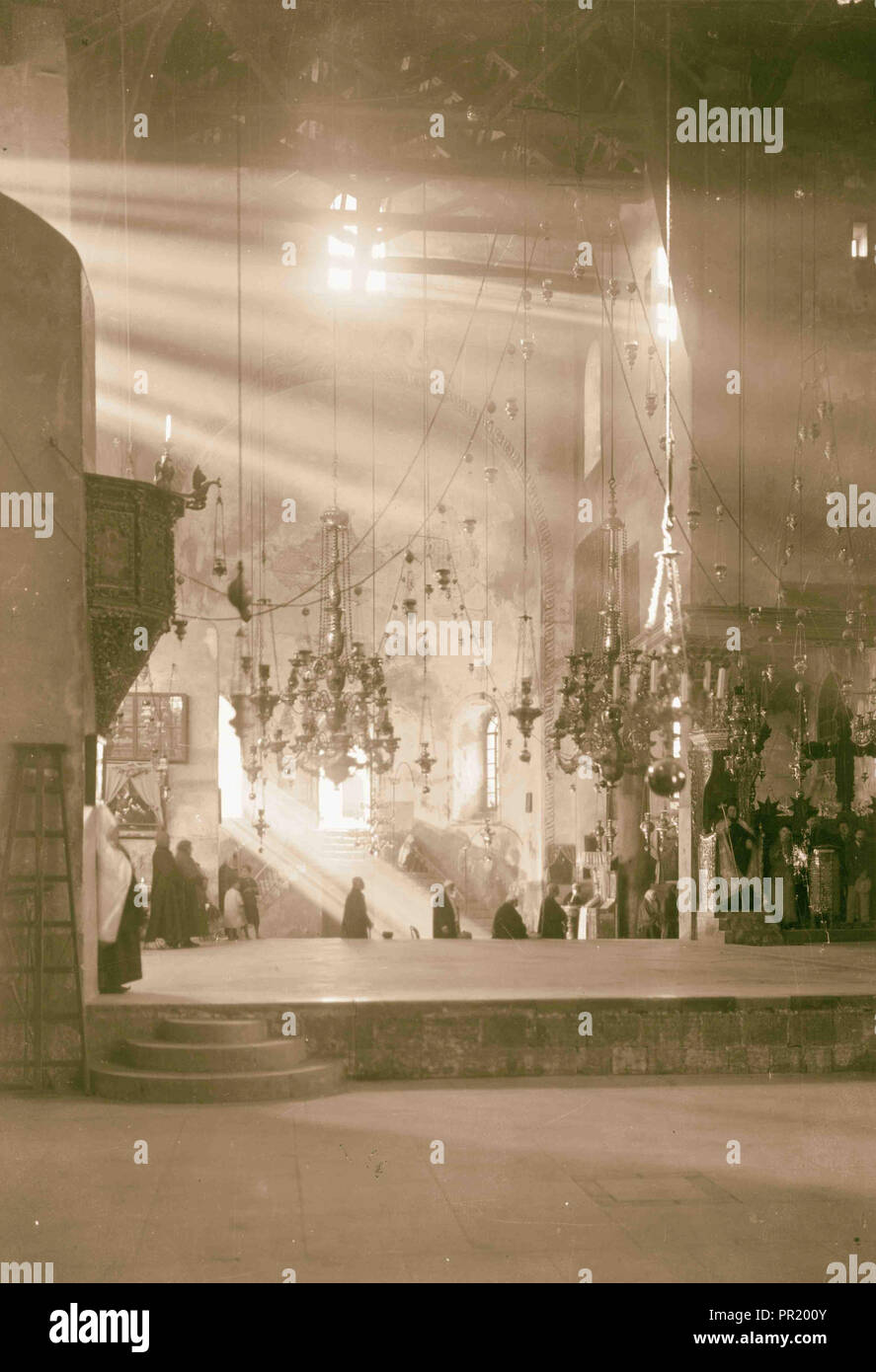 Bethlehem. Church of the Nativity. Dark interior lit by sun rays 1925 ...