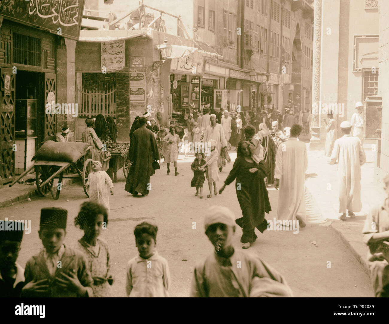 Cairo and district, Egypt. Street scene, Old Cairo. Little shops and ...